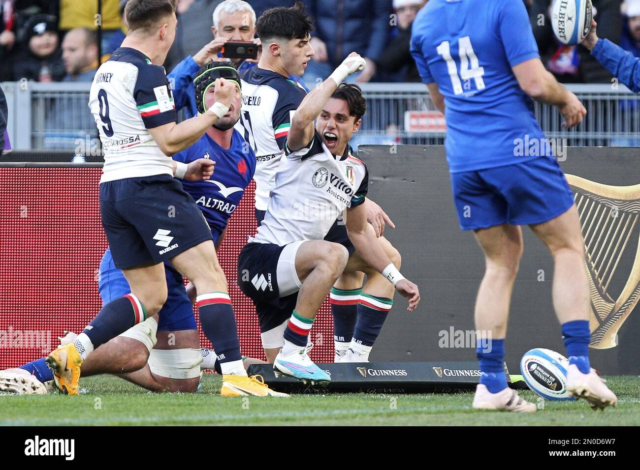 Ange Capuozzo of Italy celebrates after scoring a try during the 2023 ...