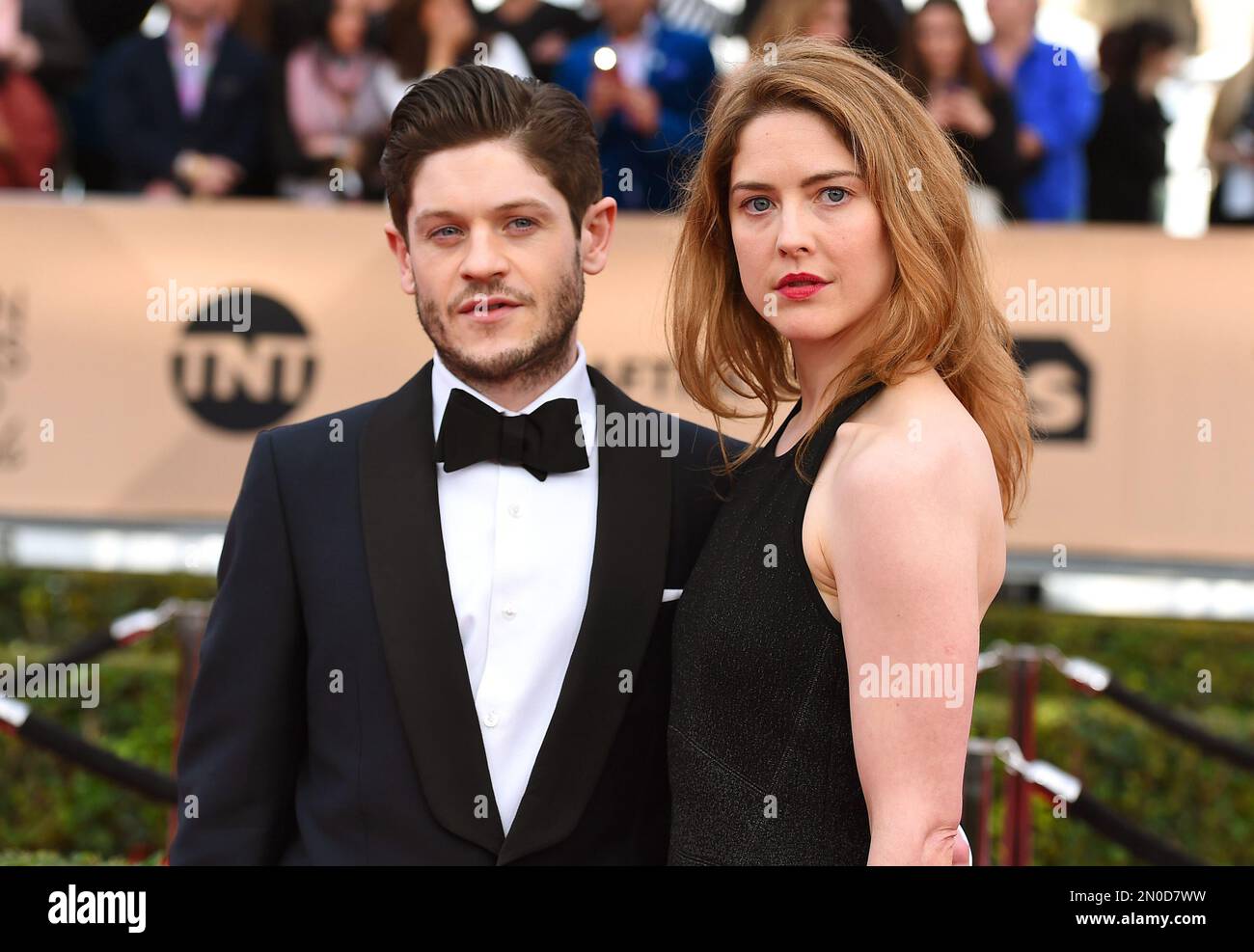 Iwan Rheon, left, and Zoe Grisedale arrive at the 22nd annual Screen ...