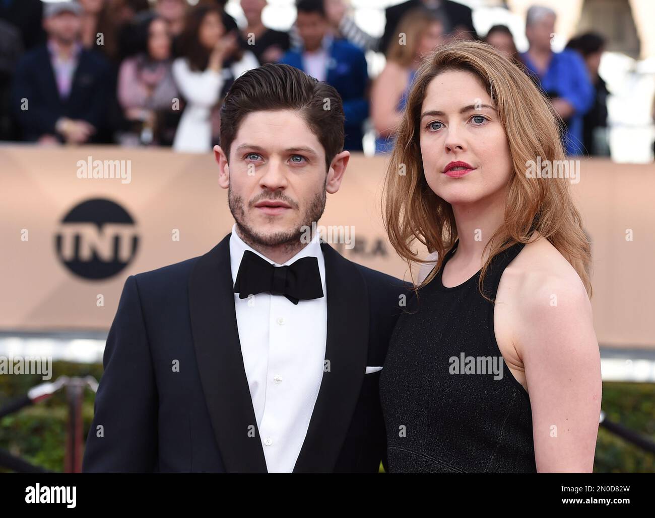 Iwan Rheon, left, and Zoe Grisedale arrive at the 22nd annual Screen ...
