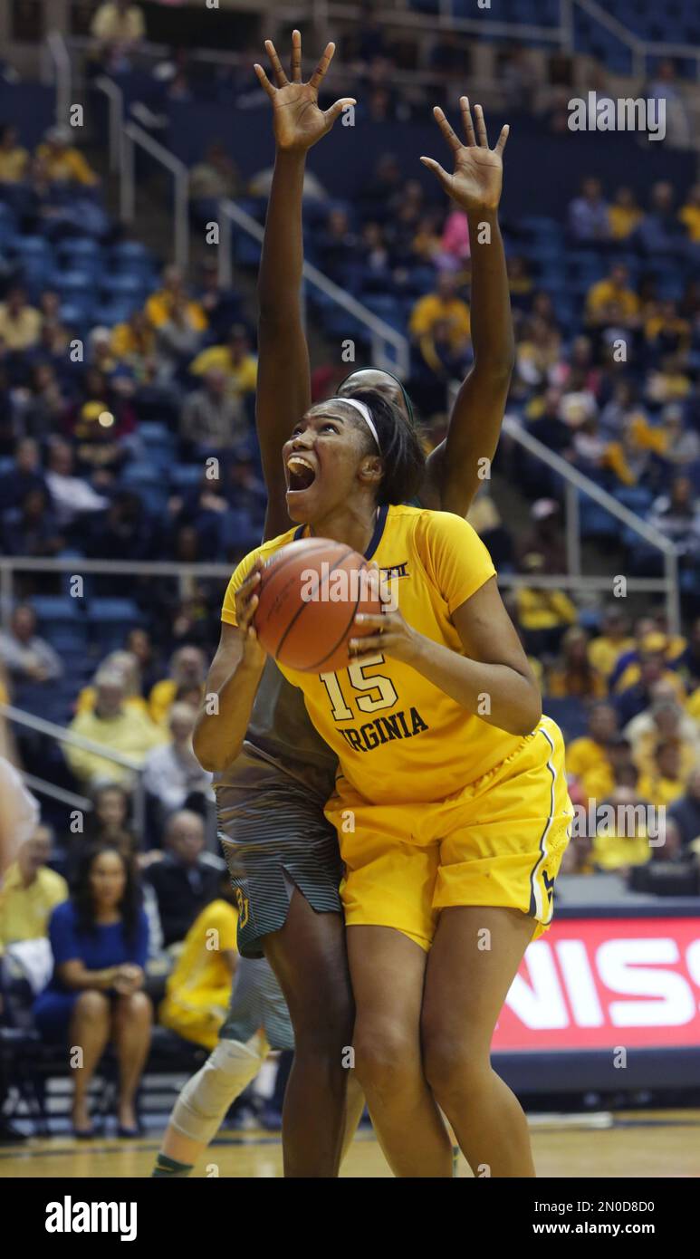 West Virginia center Lanay Montgomery (15) shoots as Baylor forward ...