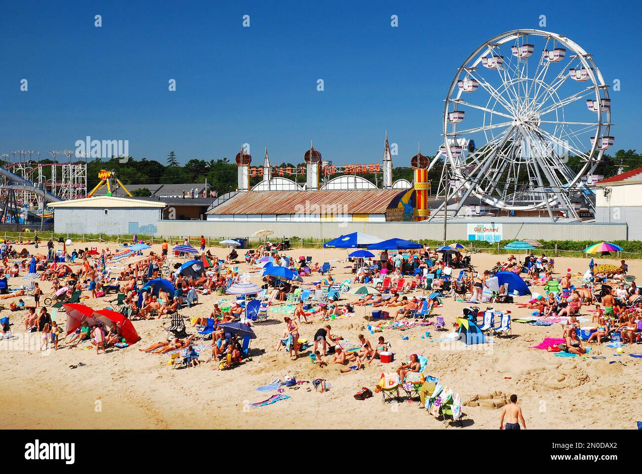 A crowded beach scene on a sunny day in Old Orchard Beach, Maine Stock ...