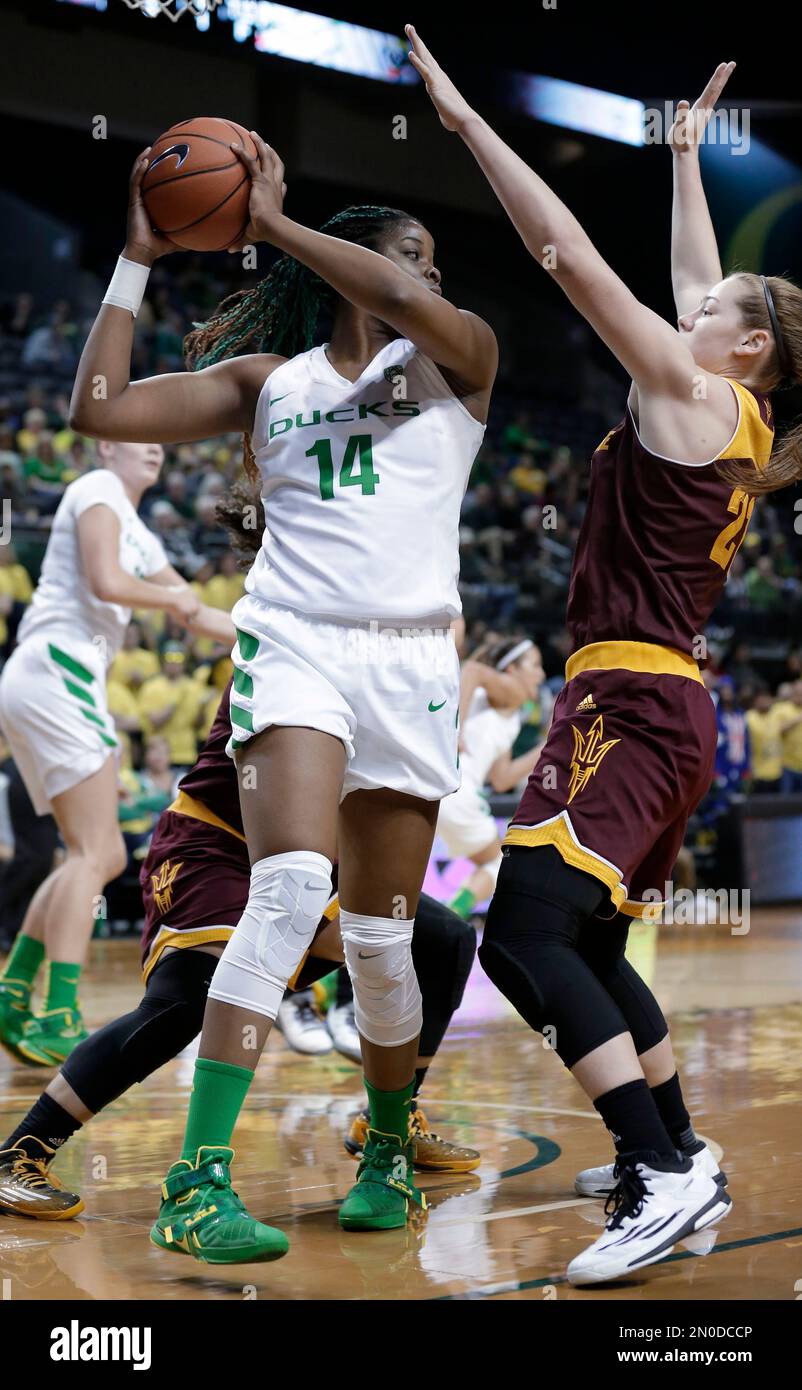 Oregon's Jillian Alleyne, left, keeps the ball away from Arizona State ...