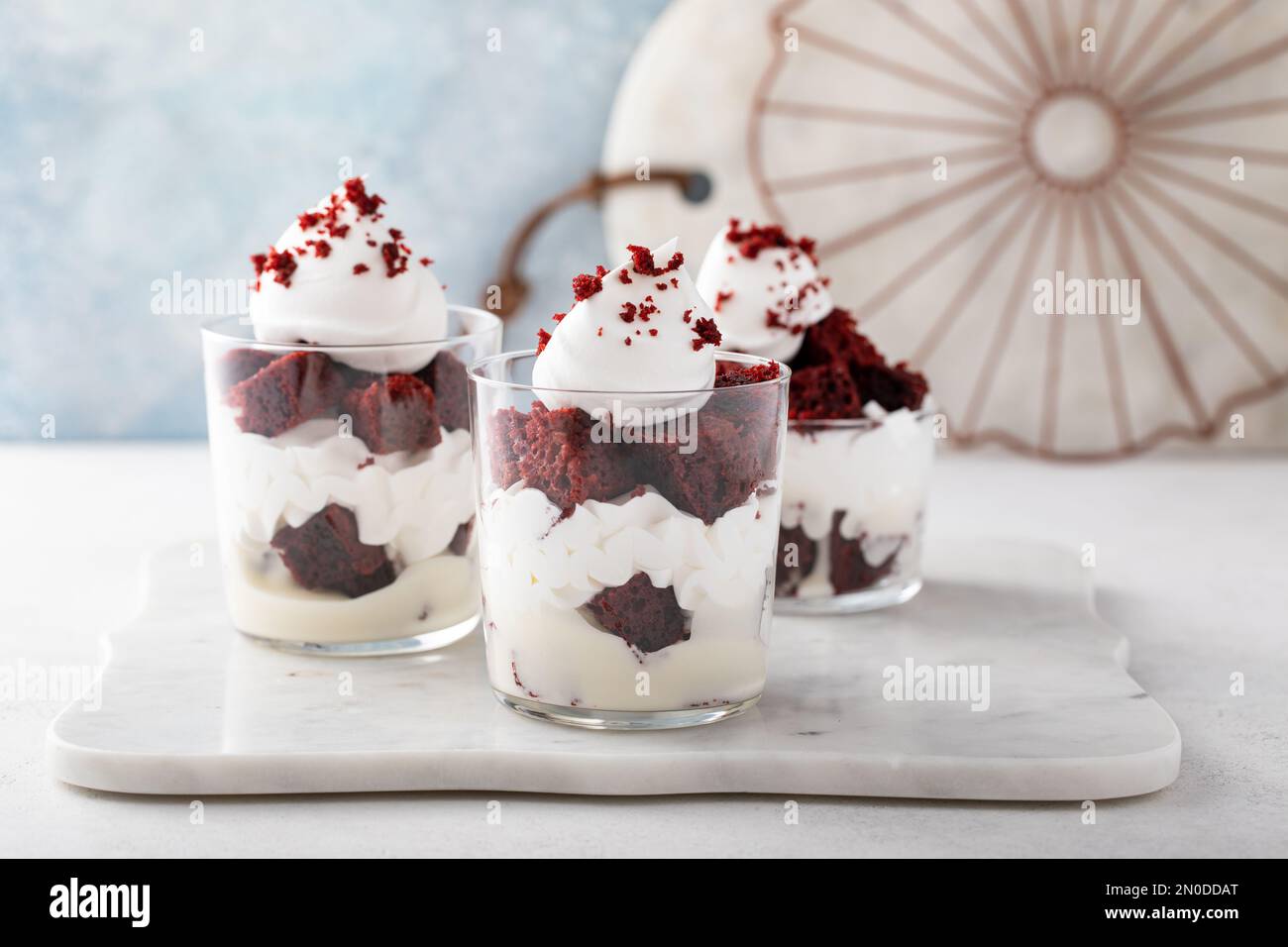 Red velvet trifle or parfait with cream cheese mousse and whipped cream ...