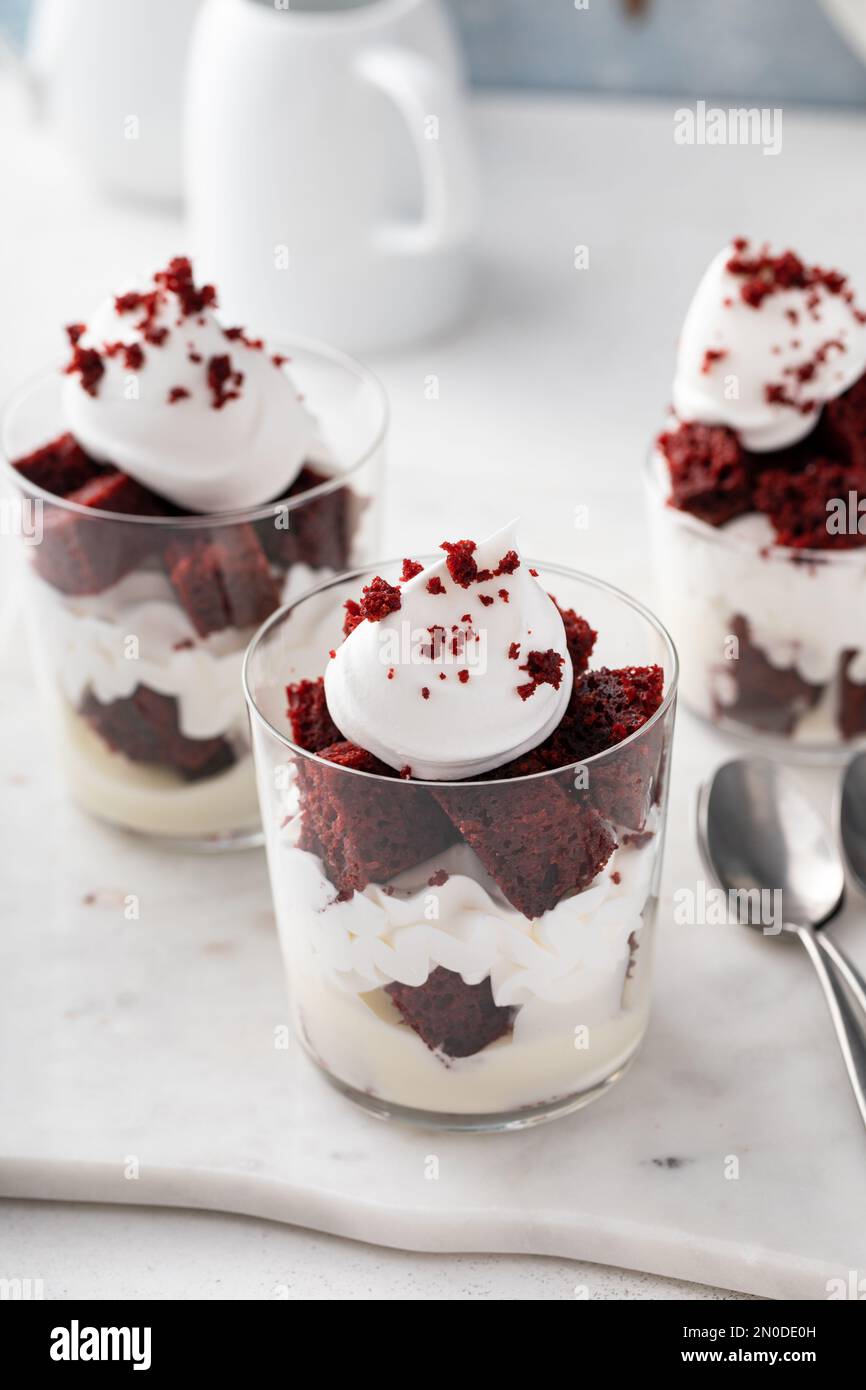 Red velvet trifle or parfait with cream cheese mousse and whipped cream ...