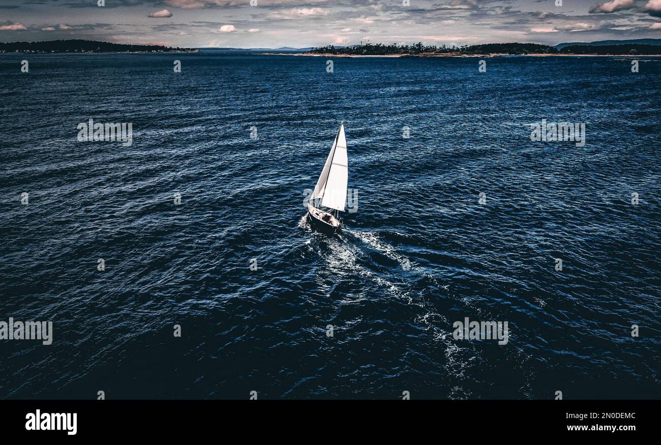An aerial view of a sailboat in the sea Stock Photo - Alamy