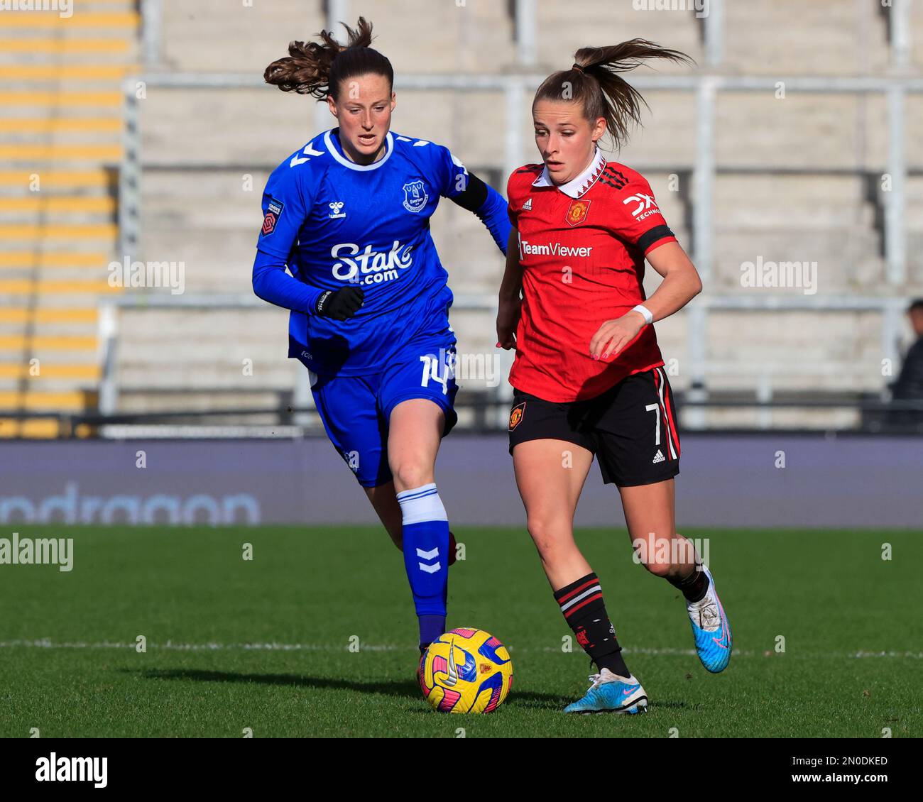 Ella Toone #7 of Manchester United is chased by Nicoline Sorensen #14 ...