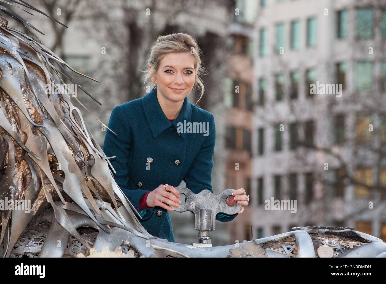 TV presenter Rachel Riley poses for photographers after unveiling a new ...