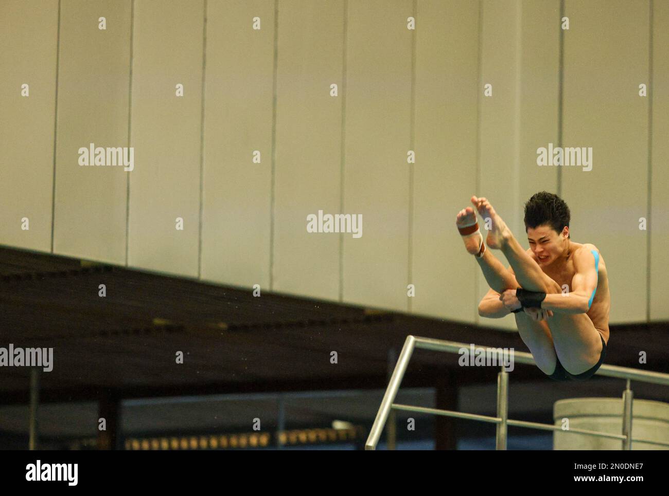Romano Wang competes in the Mens 10m Platform final during day four of ...