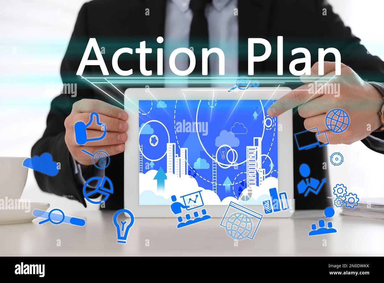 Action plan. Different icons on virtual screen and man holding tablet ...