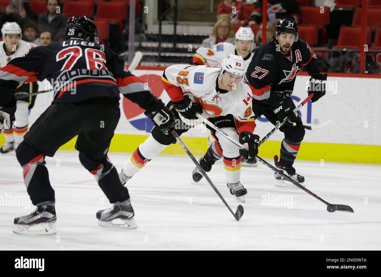 Carolina Hurricanes' John-Michael Liles (26) defends against Calgary ...