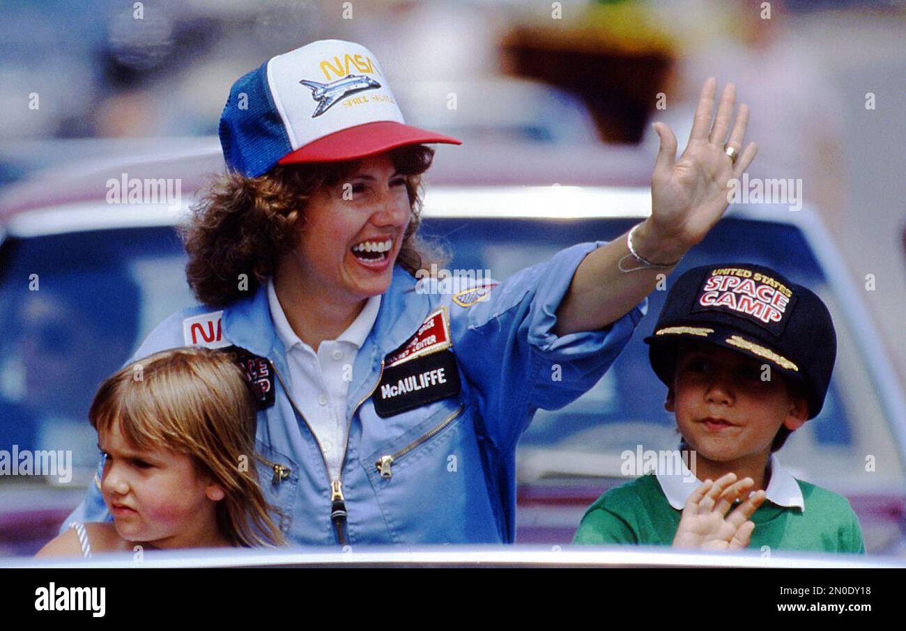 In this 1985 photo, high school teacher Christa McAuliffe rides with ...