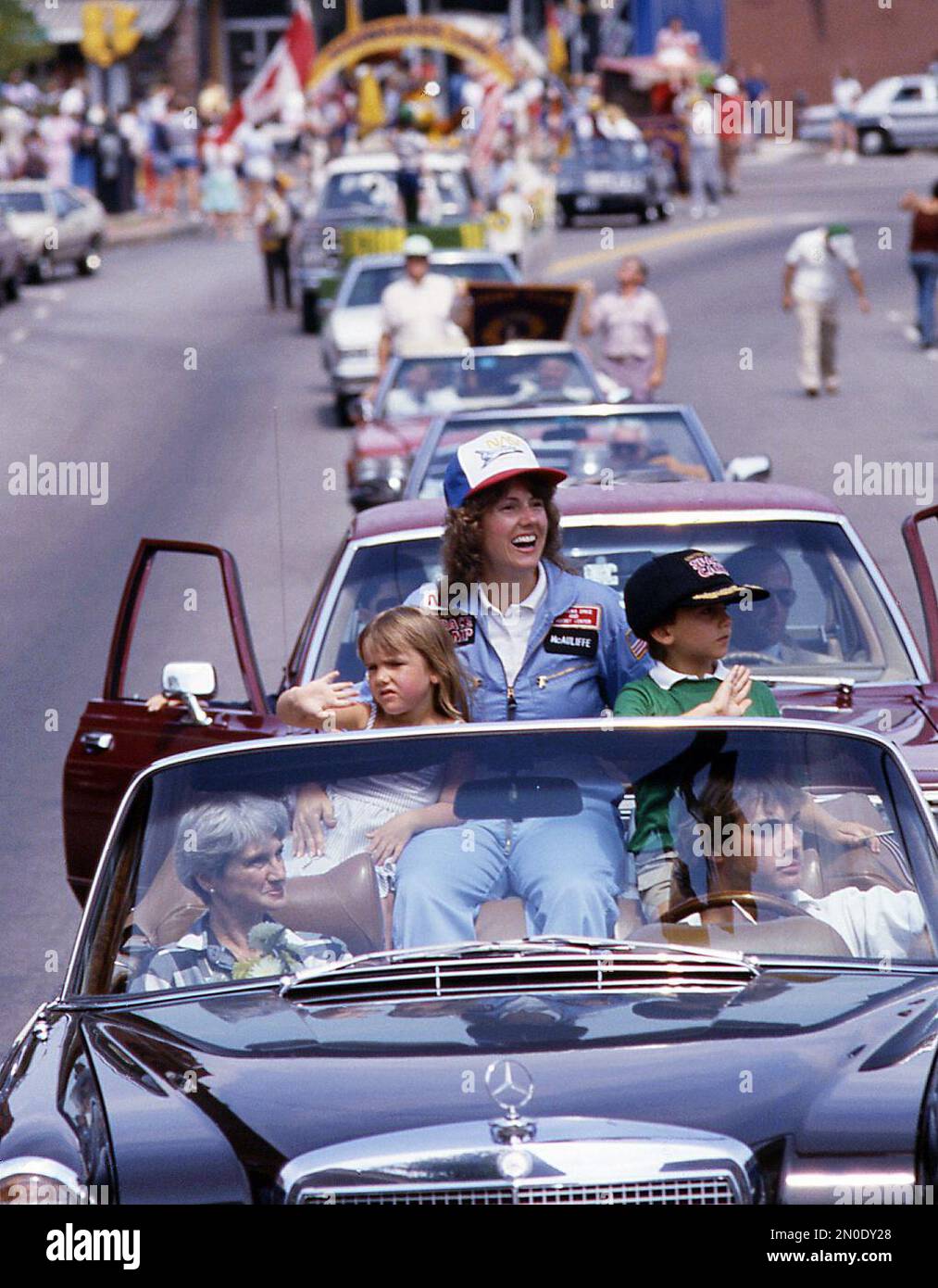 In this 1985 photo, high school teacher Christa McAuliffe rides with ...