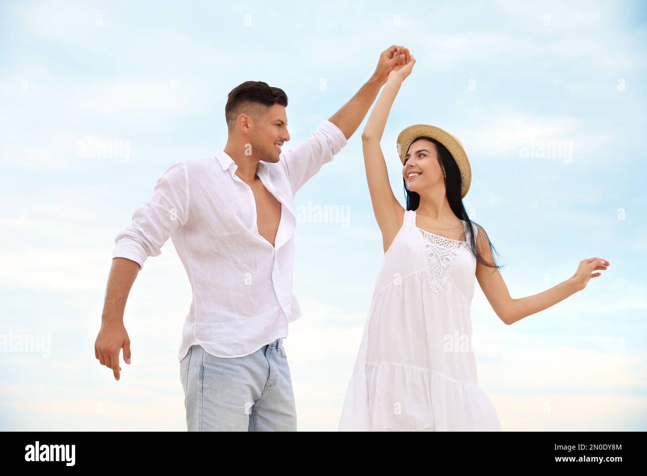 Young couple dancing outdoors hi-res stock photography and images - Alamy