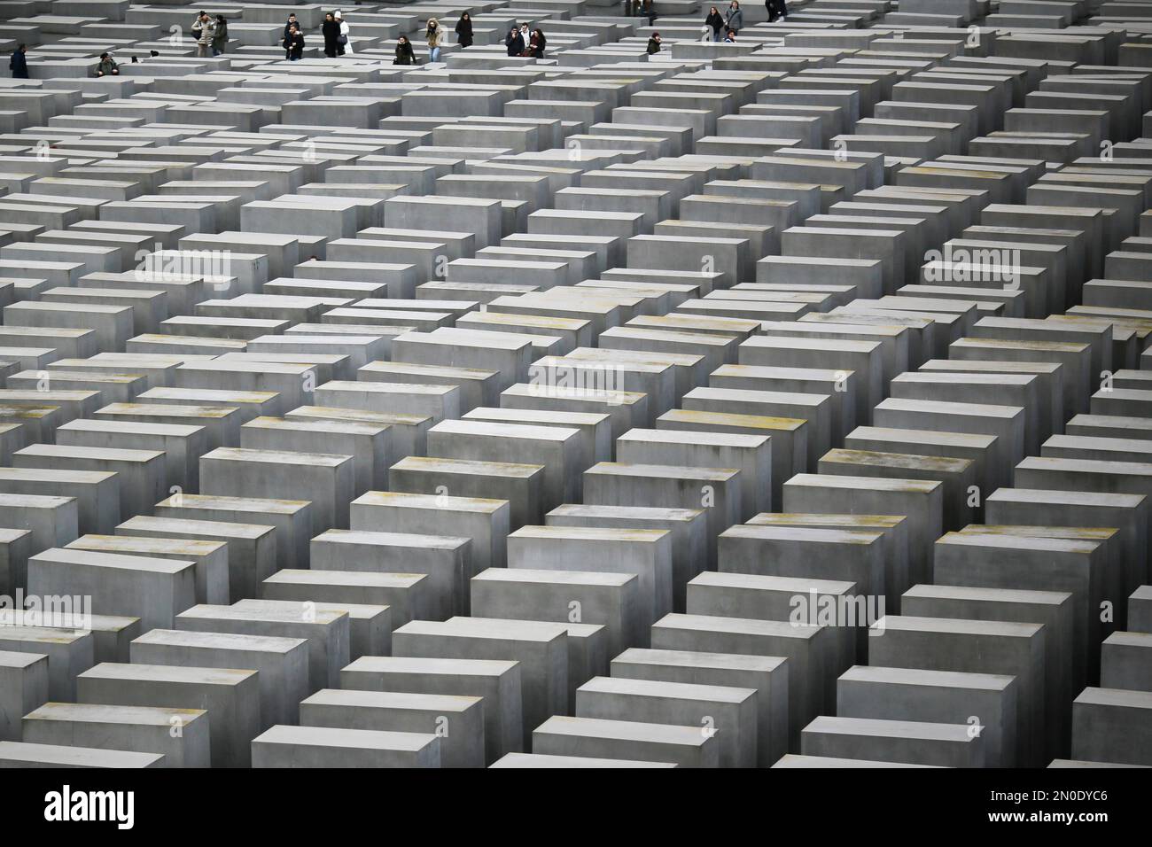 A group of visitors walk inside the Holocaust Memorial at the ...