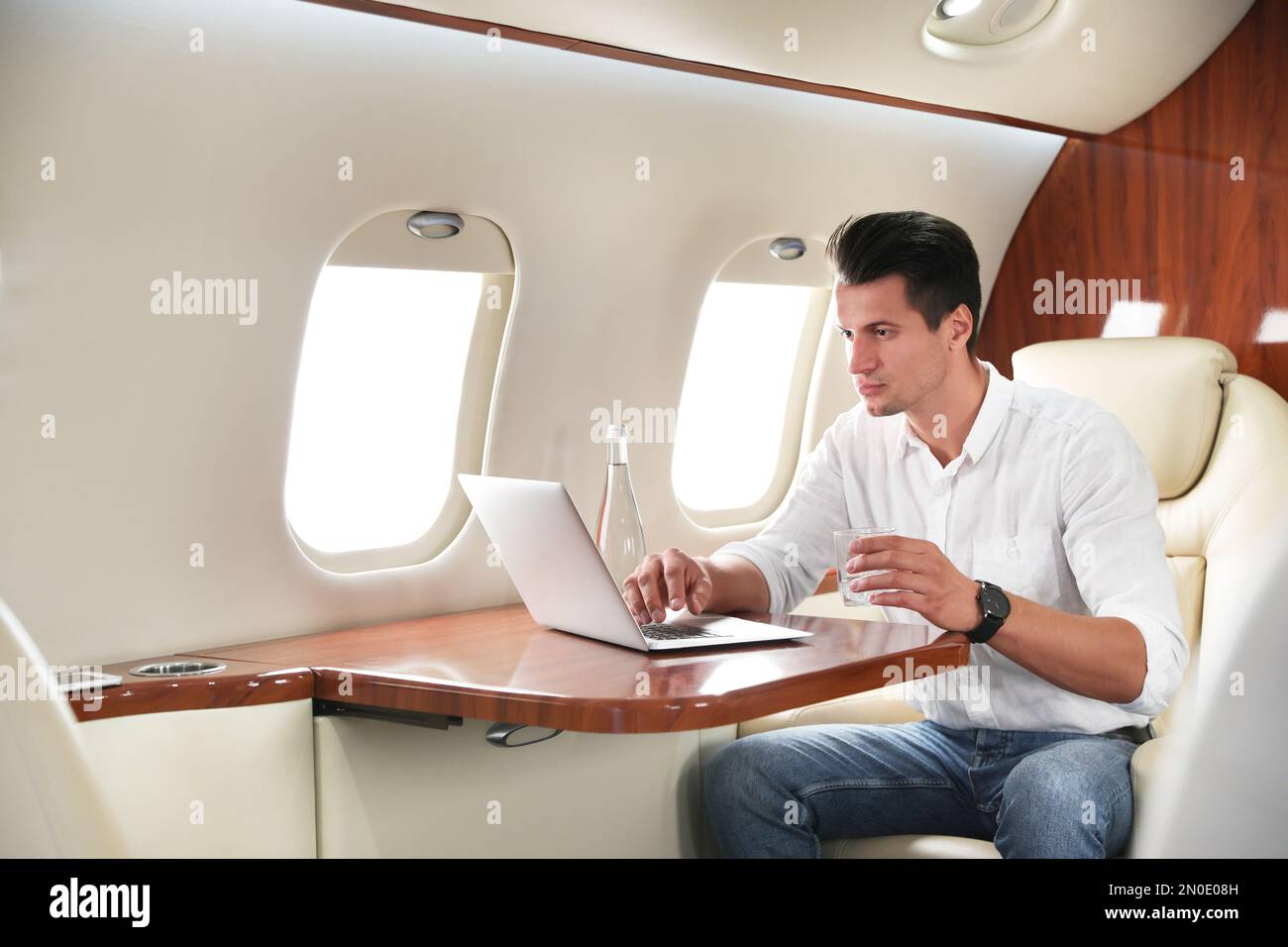 Laptop passenger seat plane hi-res stock photography and images - Alamy