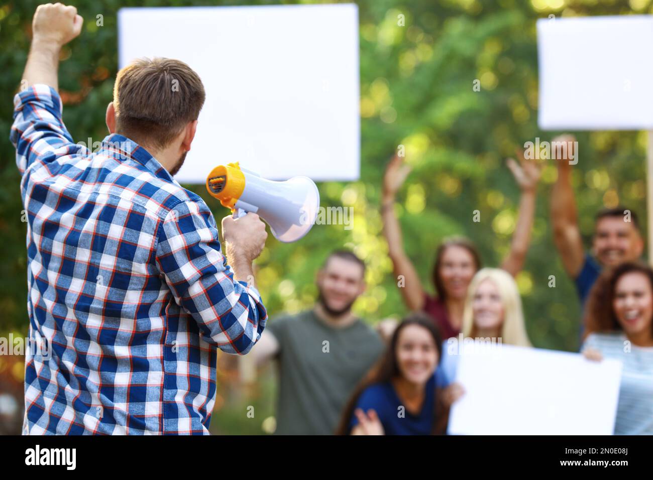Woman shouting megaphone crowd hi-res stock photography and images - Alamy
