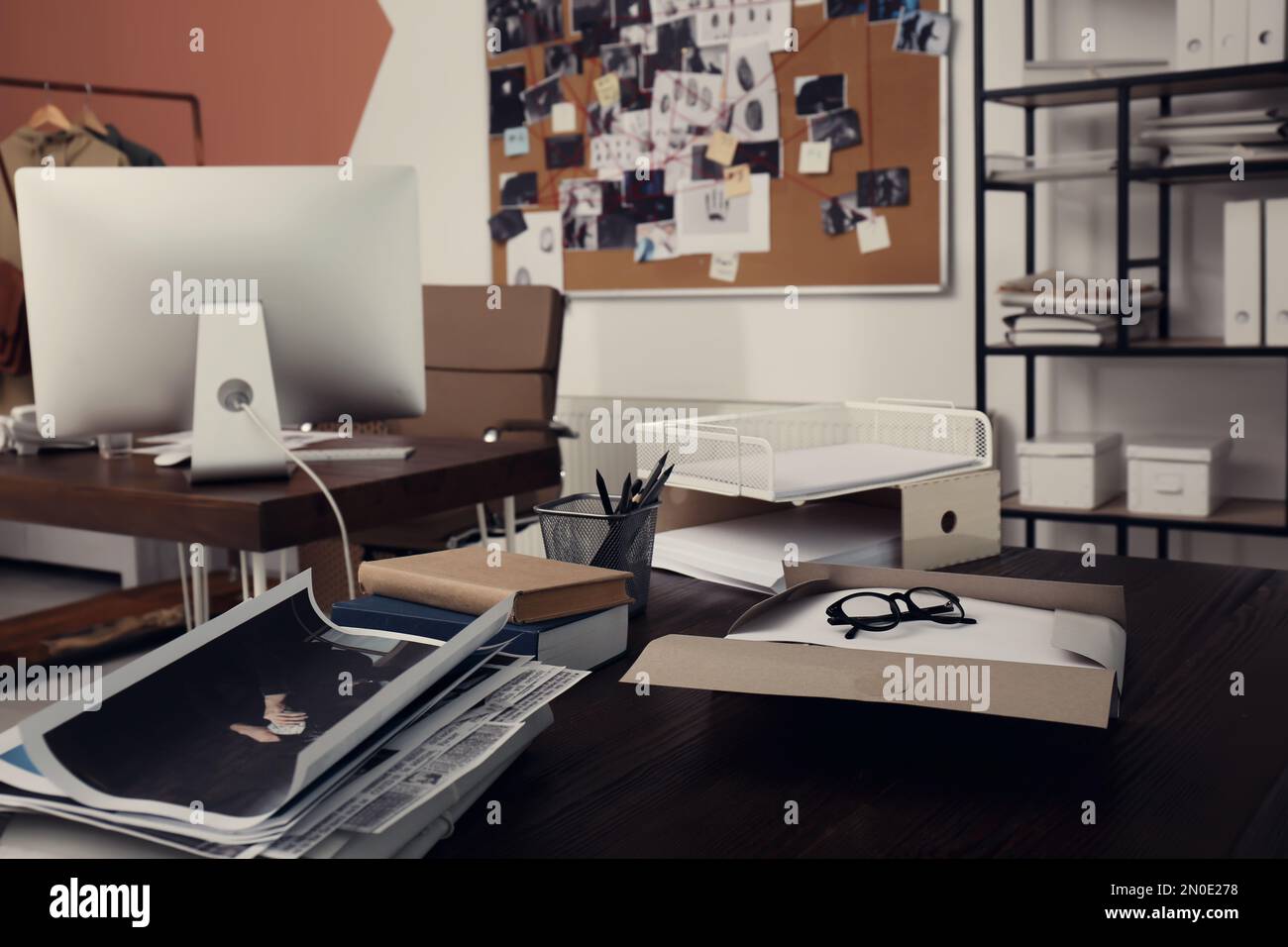 Crime scene photos and documents on table. Detective agency Stock Photo ...