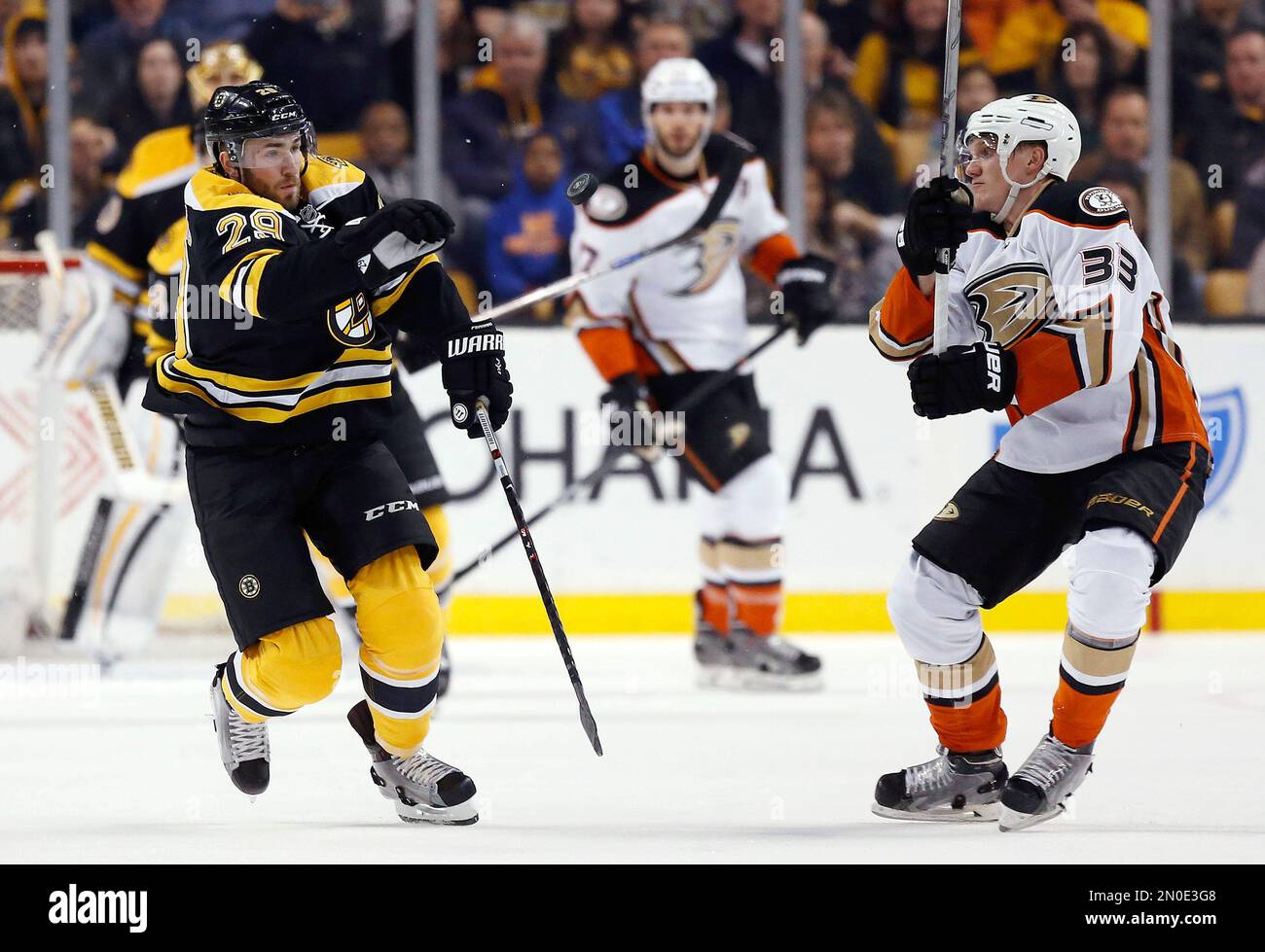 Boston Bruins' Landon Ferraro (29) and Anaheim Ducks' Jakob Silfverberg ...