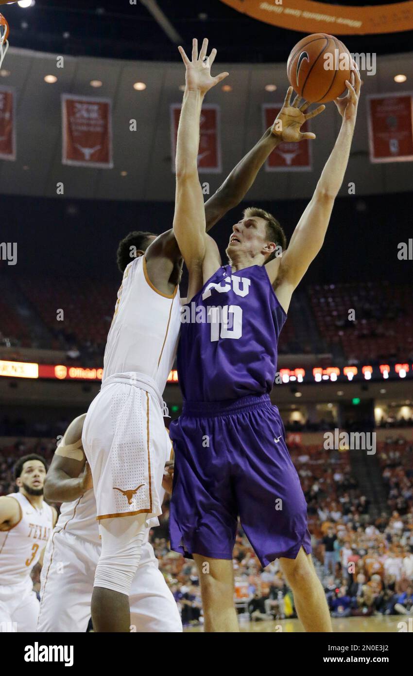 TCU forward Vladimir Brodziansky (10) scores over Texas guard Tevin ...