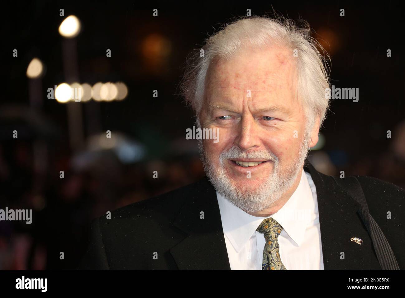 Ian Lavender poses for photographers upon arrival at the World premiere ...