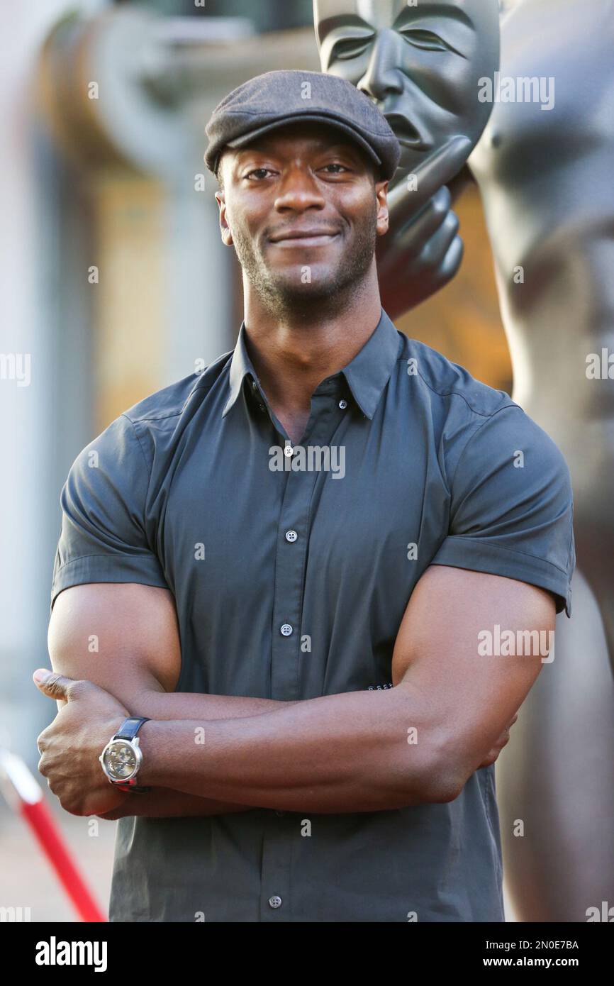 Aldis Hodge poses with the Screen Actors Guild actor statue at the TCL ...