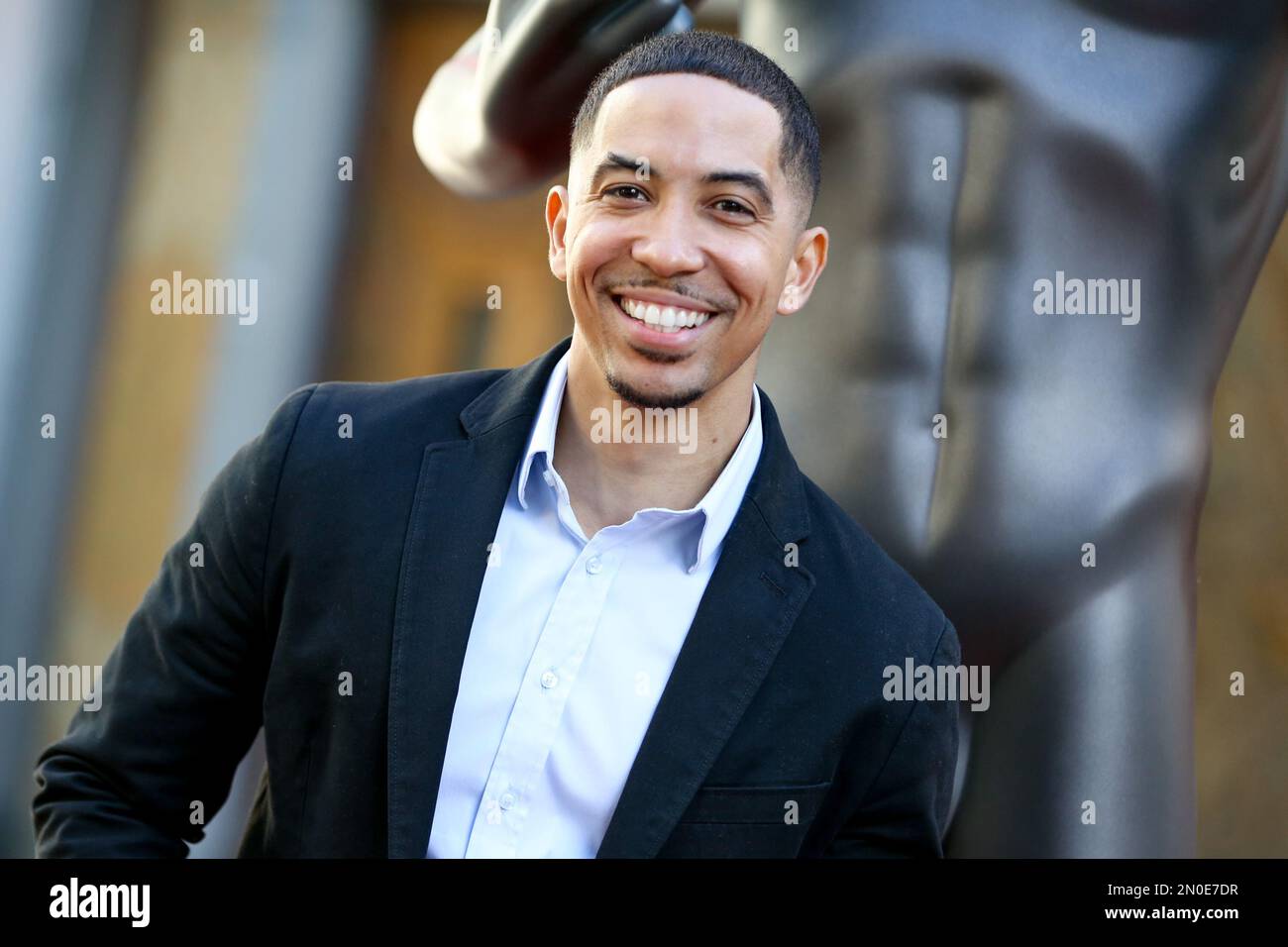 Neil Brown Jr. poses with the Screen Actors Guild actor statue at the ...
