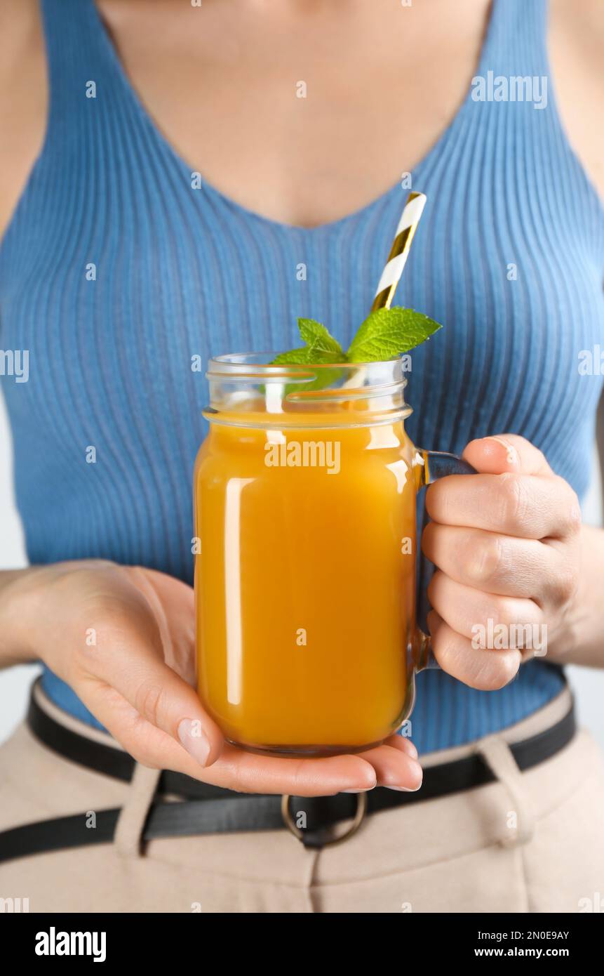 Woman juice jar hi-res stock photography and images - Alamy