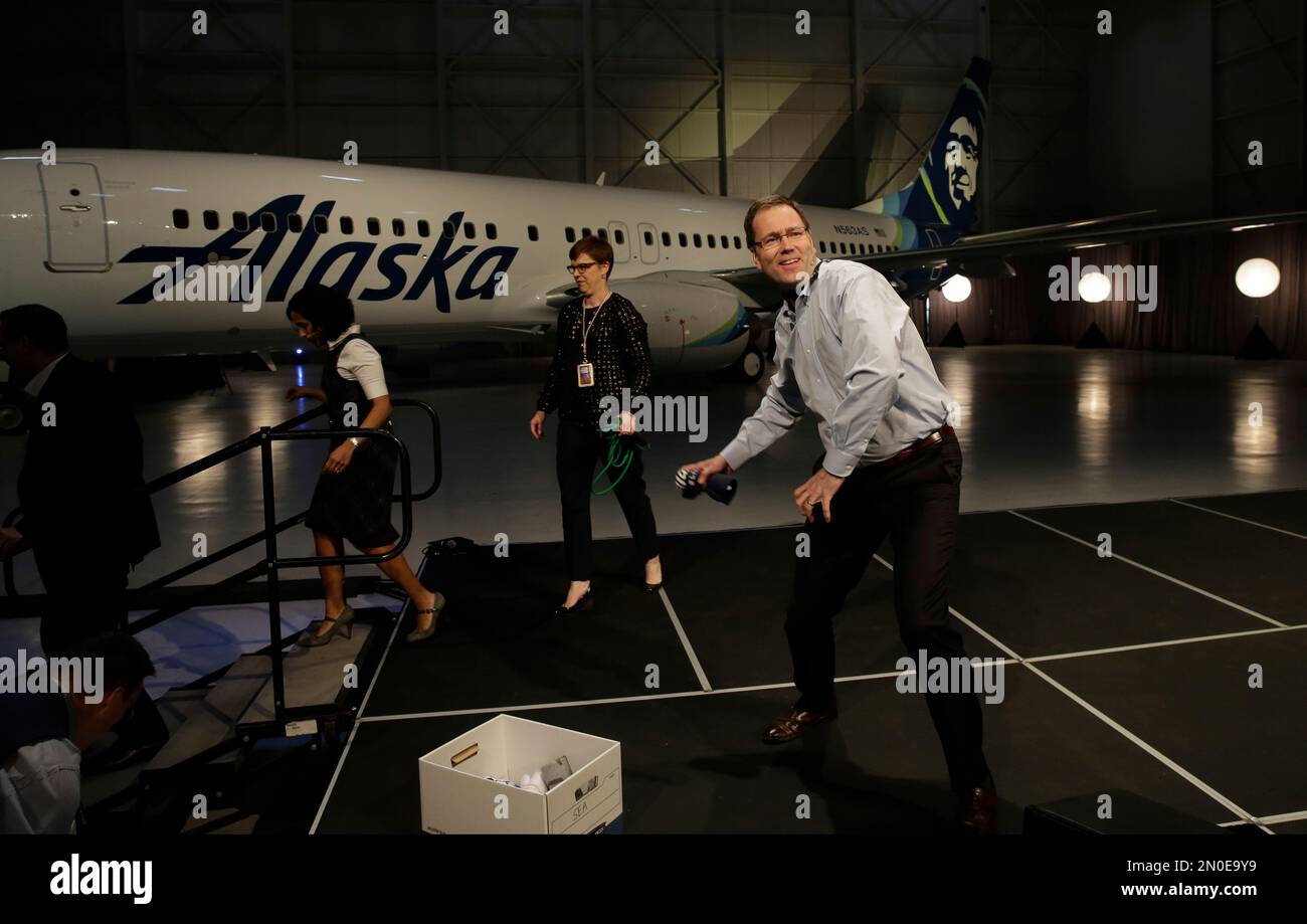 Alaska Airlines CEO Brad Tilden throws t-shirts during an employee ...