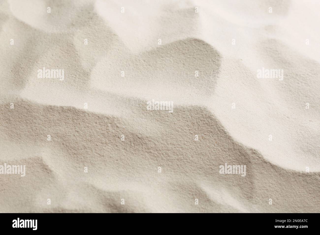 Dry beach sand as background, closeup view Stock Photo - Alamy