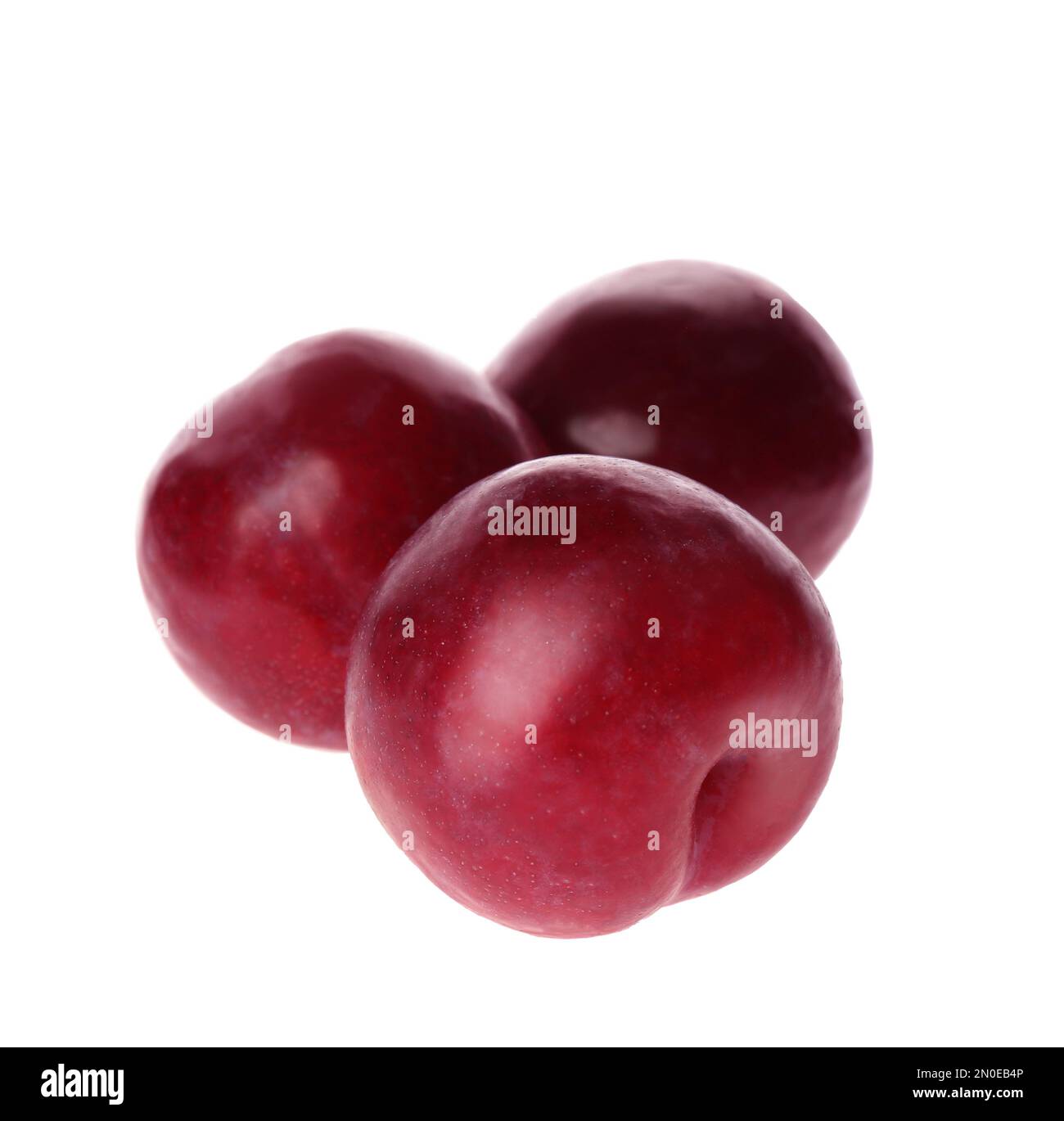 Delicious fresh ripe plums isolated on white Stock Photo - Alamy