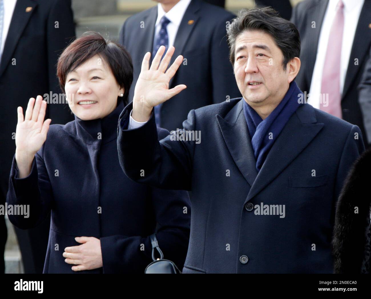 Japanese Prime Minister Shinzo Abe and his wife Akie wave to Emperor ...