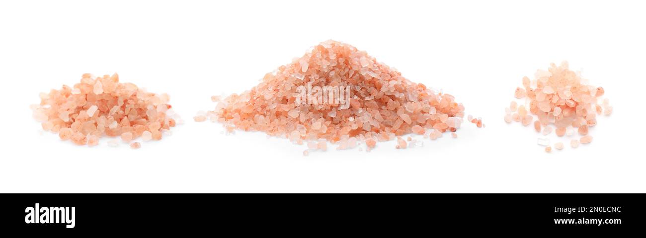 Piles of pink himalayan salt on white background. Banner design Stock ...