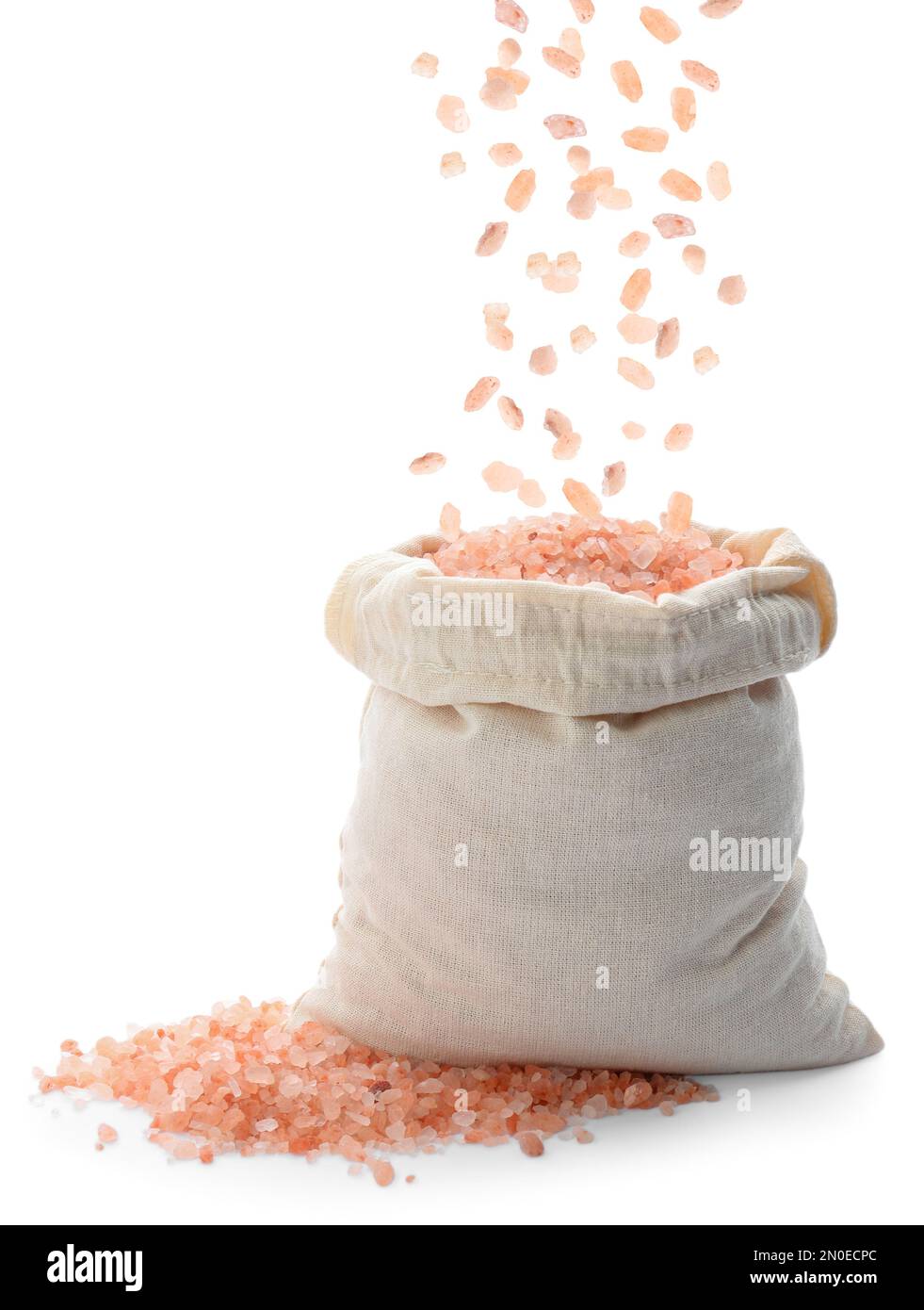 Pink himalayan salt falling into sack on white background Stock Photo ...