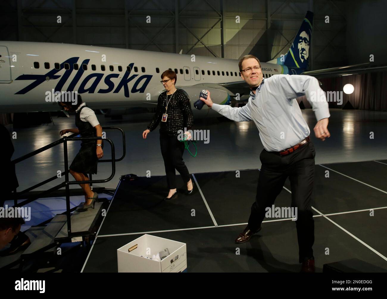 Alaska Airlines CEO Brad Tilden throws T-shirts during an employee ...