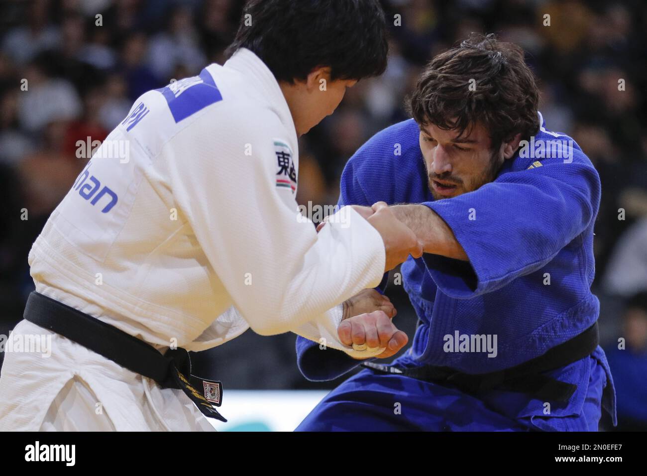 Etienne Briand (CAN) competed against Kenya Kohara (JPN) during the ...