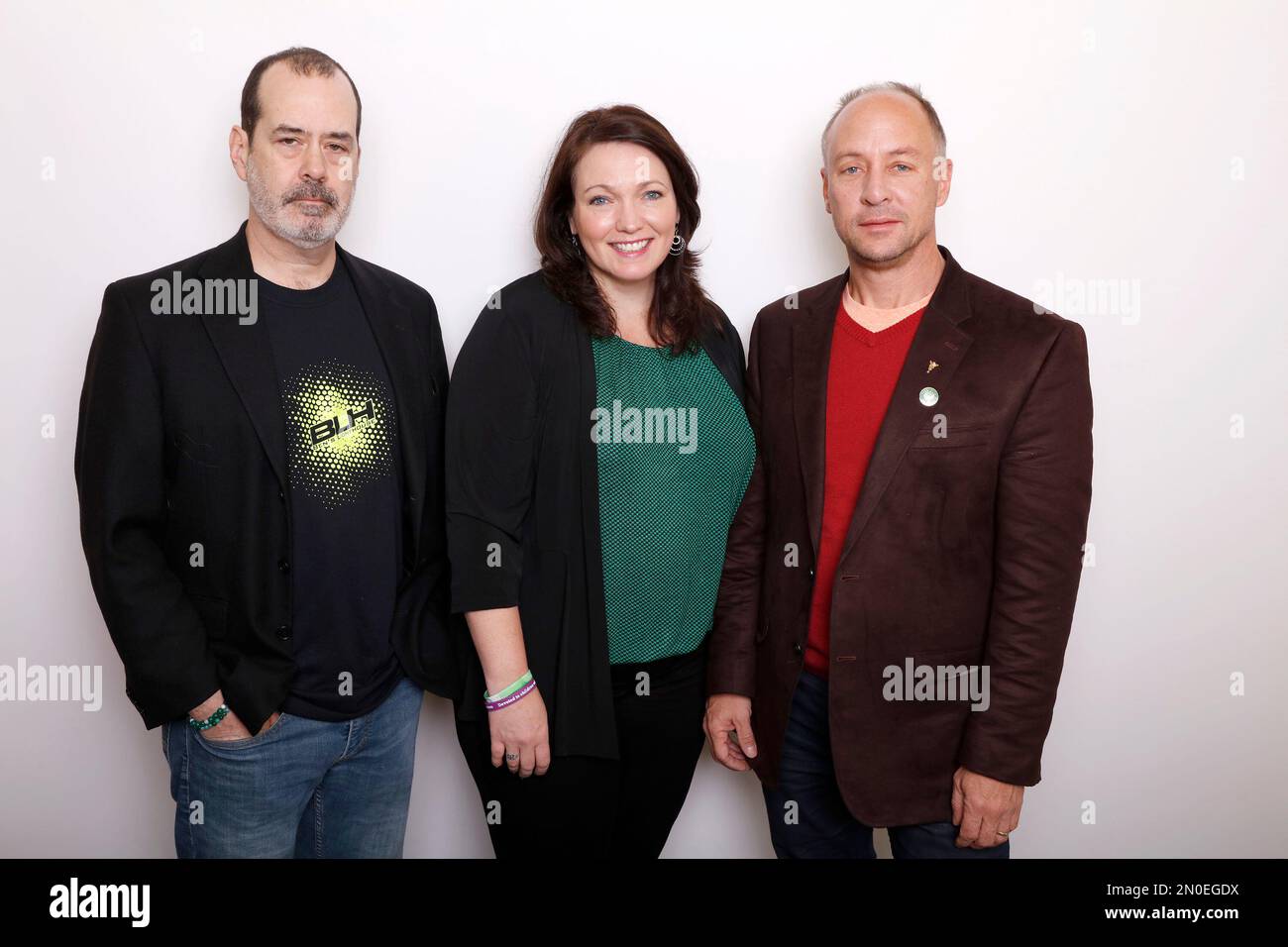 David Wheeler, from left, Nicole Hockley and Mark Barden pose for a ...