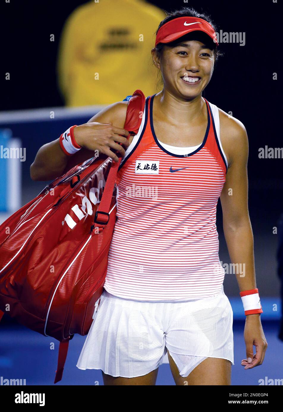 Zhang Shuai of China smiles as she leaves Rod Laver Arena after ...