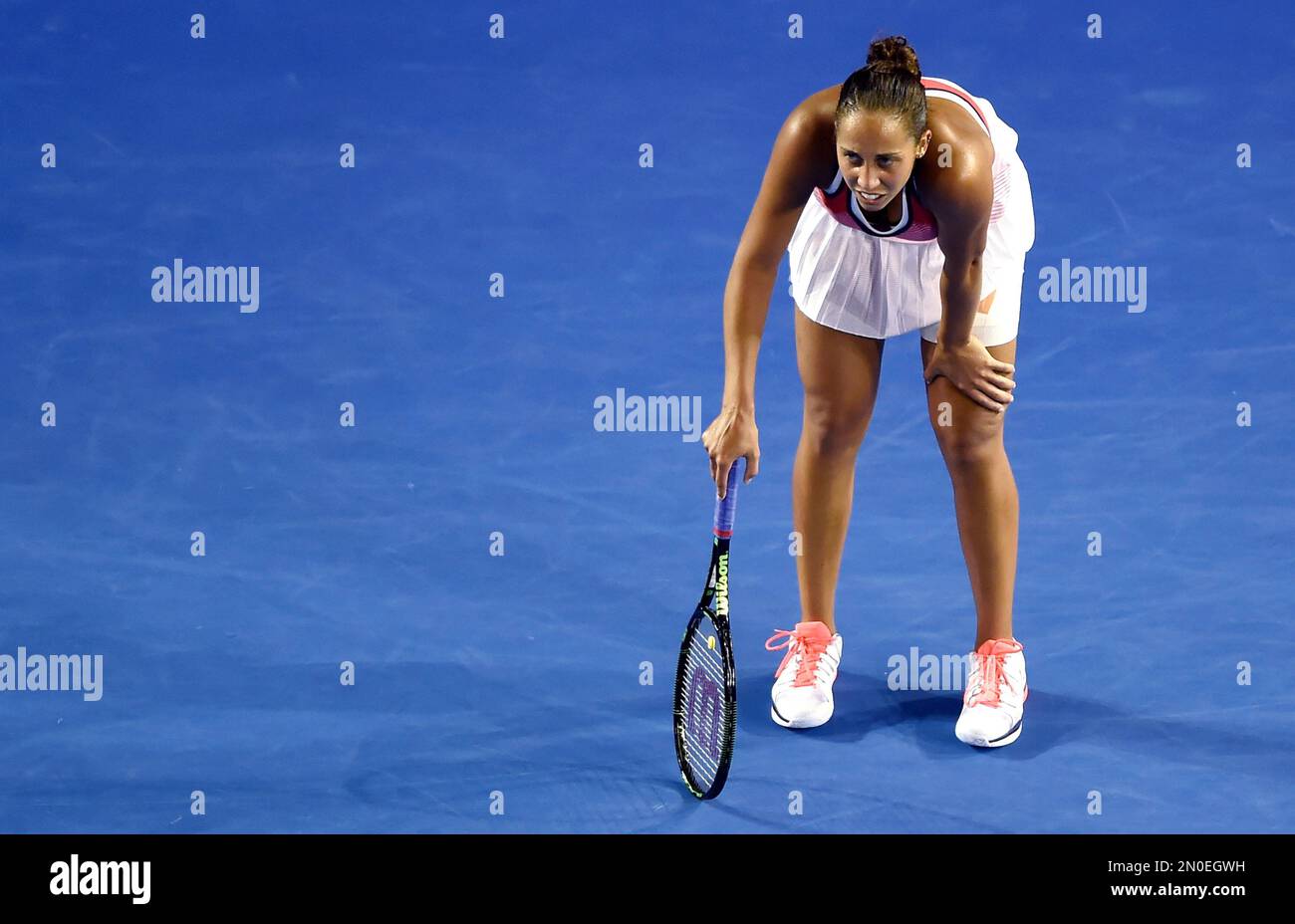 Madison Keys of the United States rests on her racket during her fourth ...