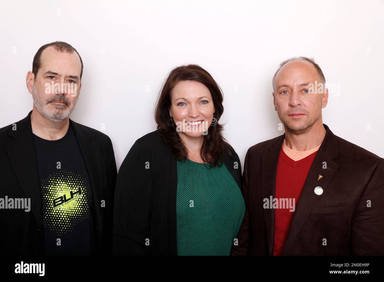 From left, David Wheeler, Nicole Hockley, Mark Barden, pose for a ...