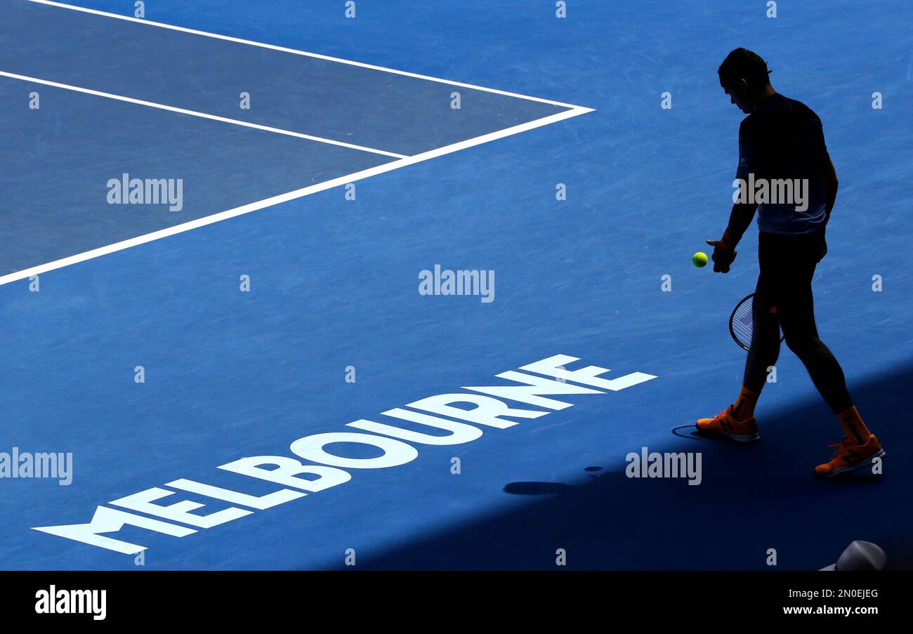 Milos Raonic of Canada prepares to serve during his fourth round match ...