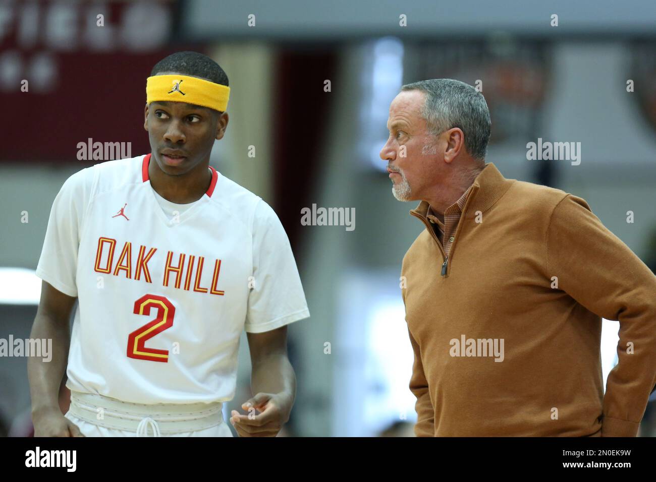 Oak Hill's head coach Steve Smith is seen with Matt Coleman #2 against ...