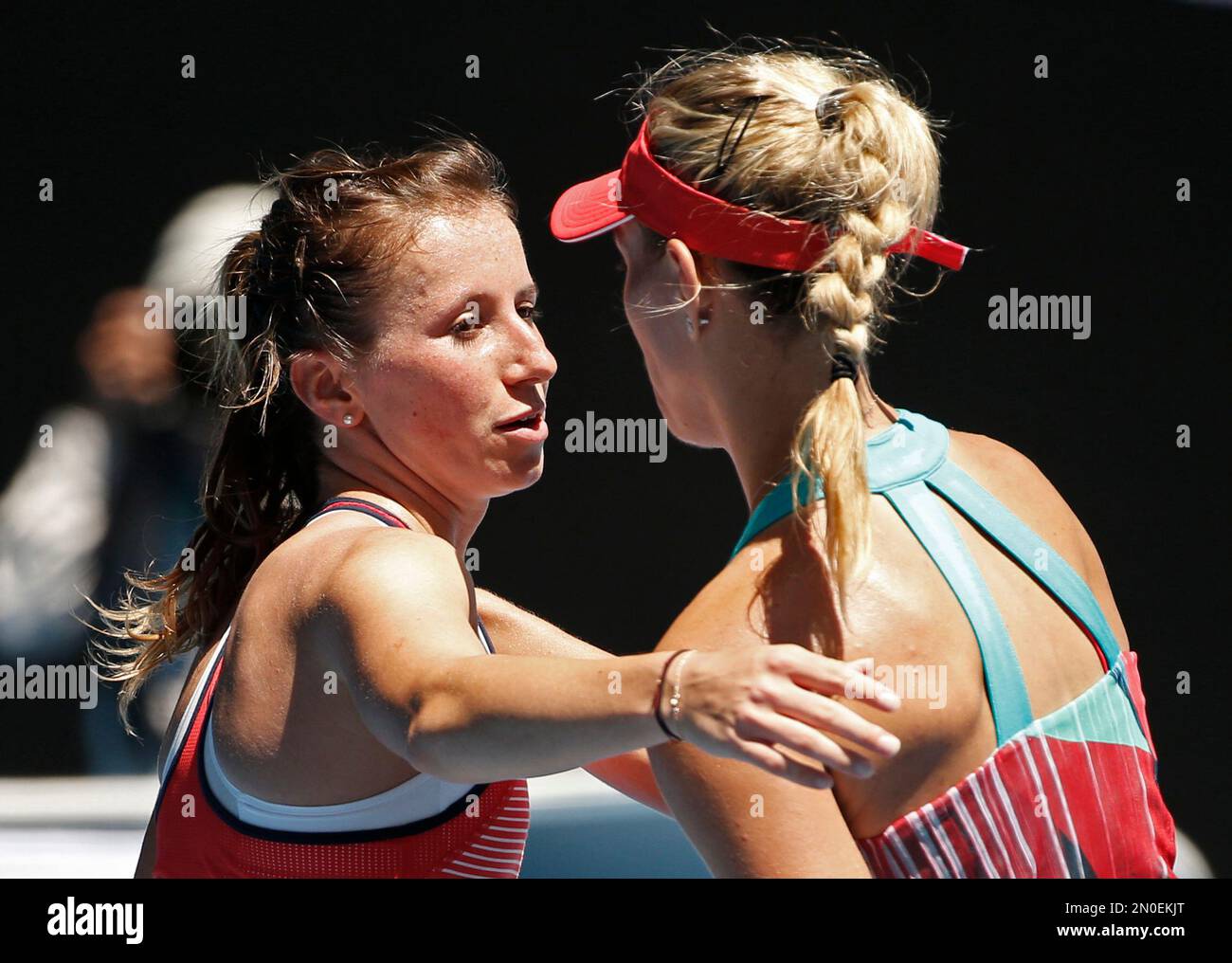 Angelique Kerber, right, of Germany embraces compatriot Annika Beck ...