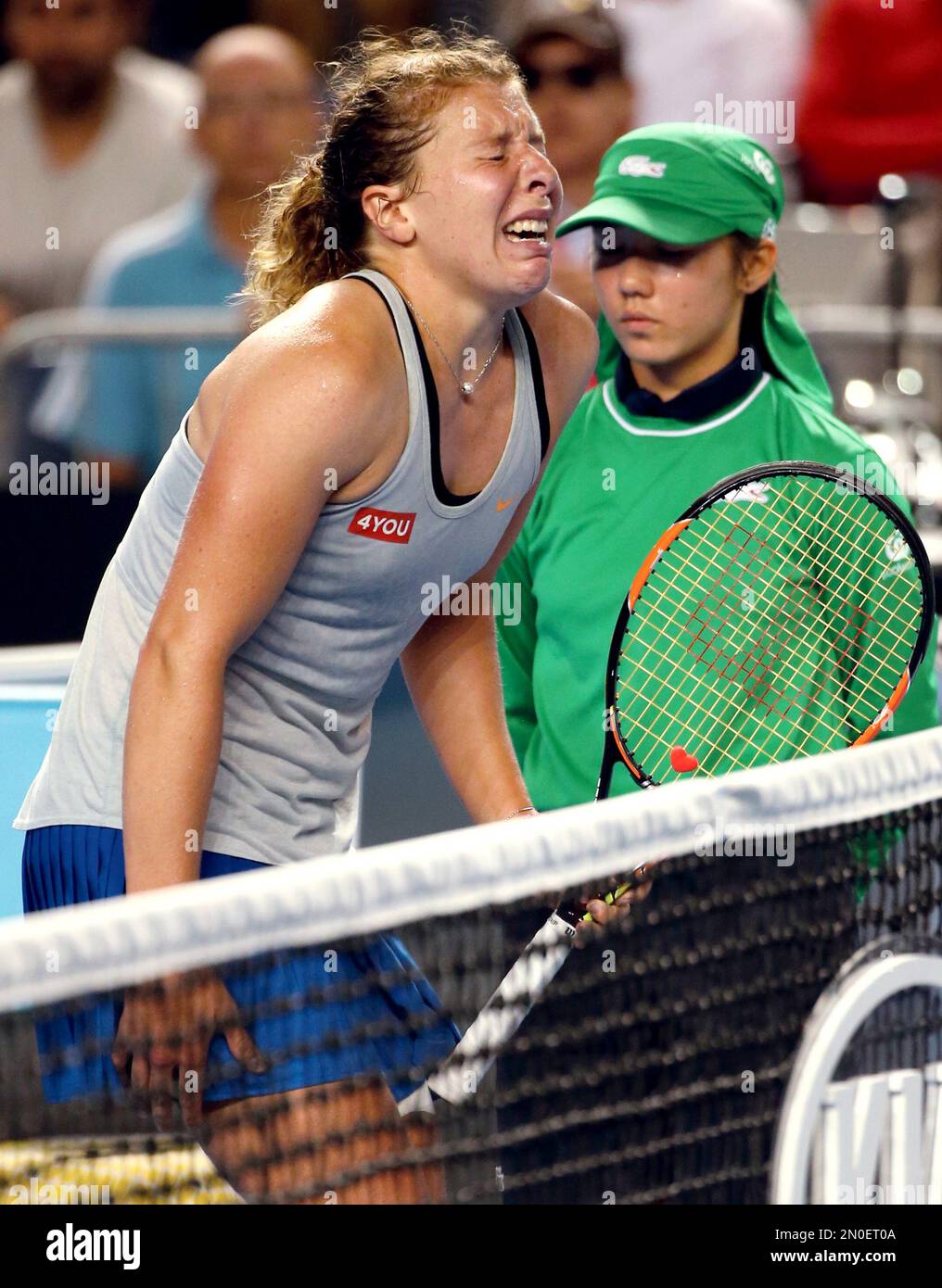 Anna-Lena Friedsam of Germany cries during her fourth round match ...