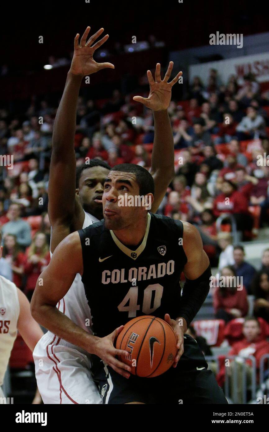 Colorado's Josh Scott (40) drives while defended by Washington State's ...