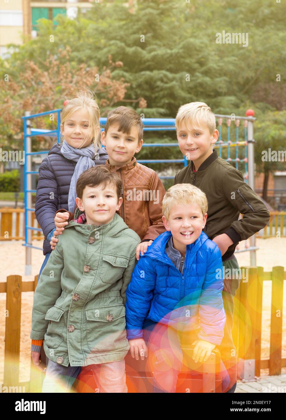 Happy kids on playground Stock Photo - Alamy