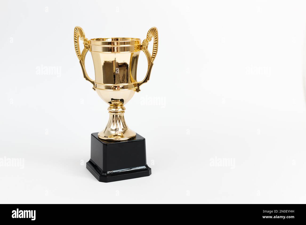 Golden Winner prize Cup on White background Stock Photo - Alamy