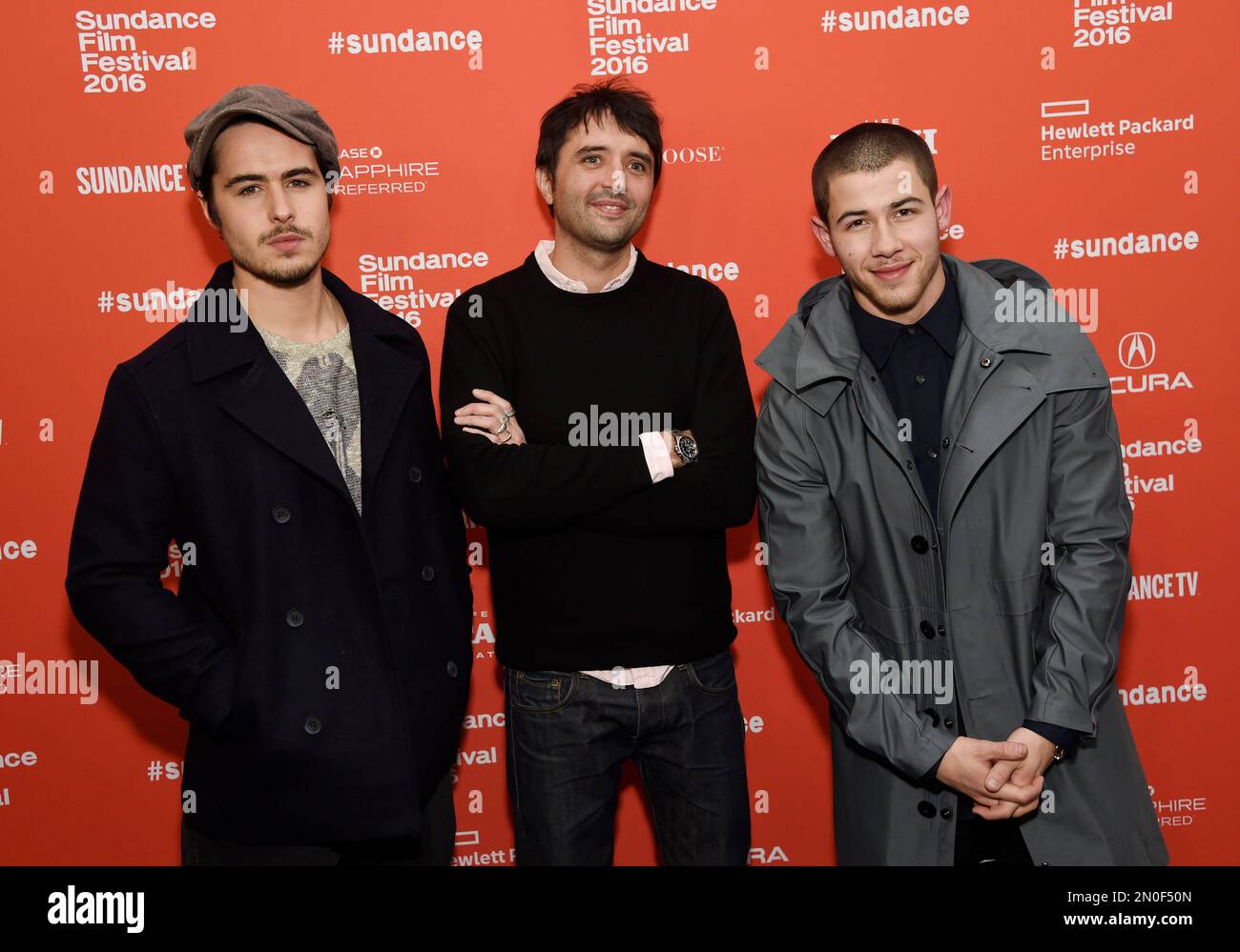 Andrew Neel, center, co-screenwriter and director of "Goat," poses with ...