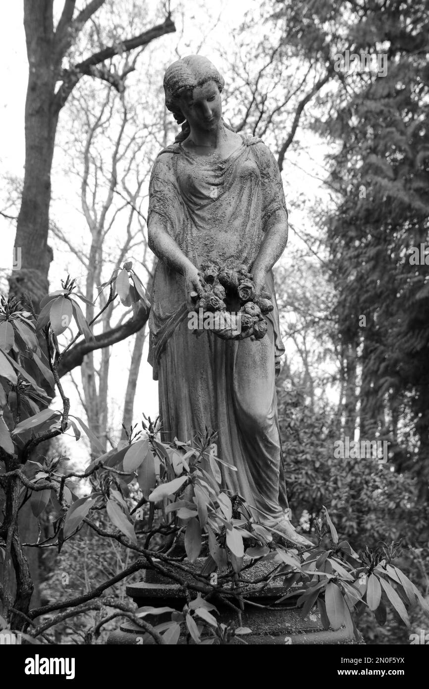 Old misery statue hi-res stock photography and images - Alamy