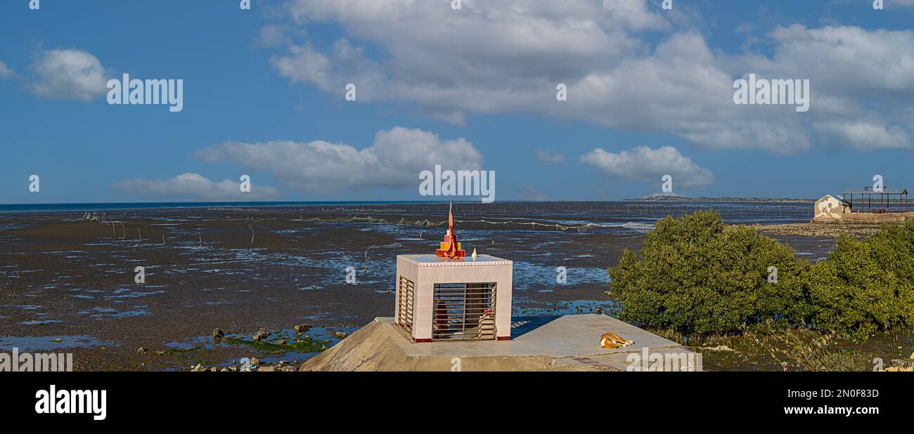 A small temple by the side of Kori creek in Koteshwar during the low ...