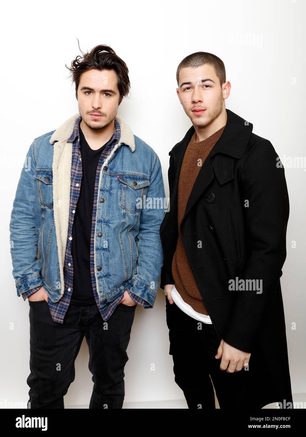 Actors Ben Schnetzer, left, and Nick Jonas pose for a portrait to ...